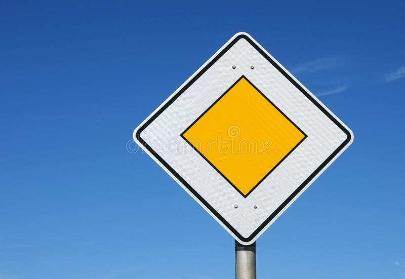 Yellow diamond road sign stock image. Image of street - 17814035