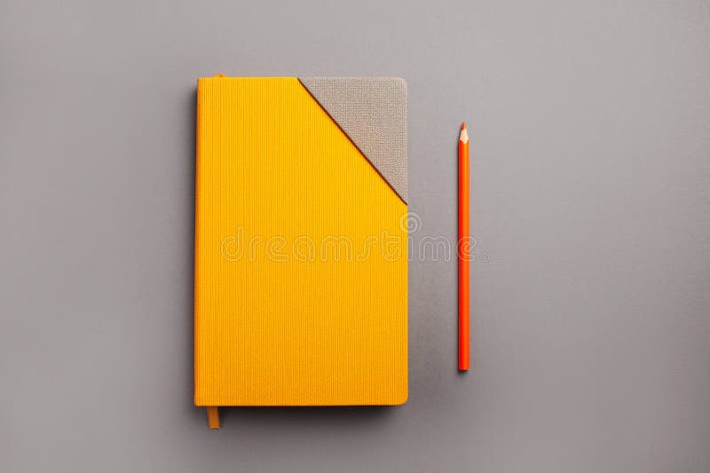 Yellow Diary Note Book On Wooden Desk Stock Photo - Image of closeup ...
