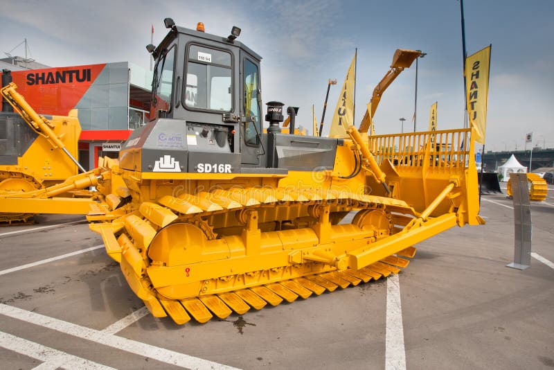 Yellow diesel bulldozer editorial stock photo. Image of construction ...