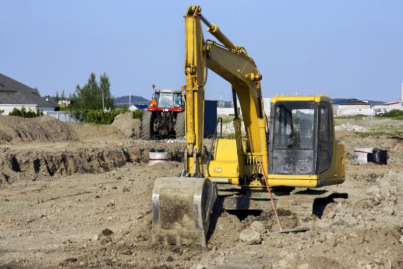 Yellow Digger at Big Job Site Stock Photo - Image of machinery, bucket ...