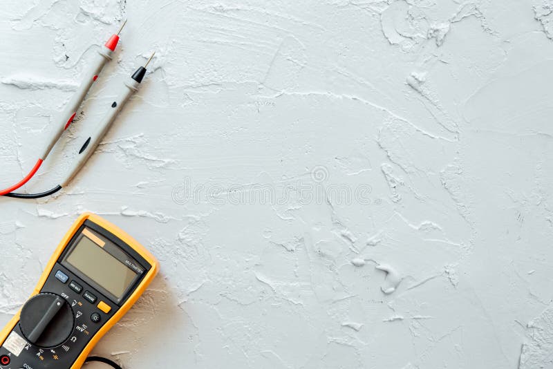 Yellow Digital Multimeter with Probes on White Background with Free ...