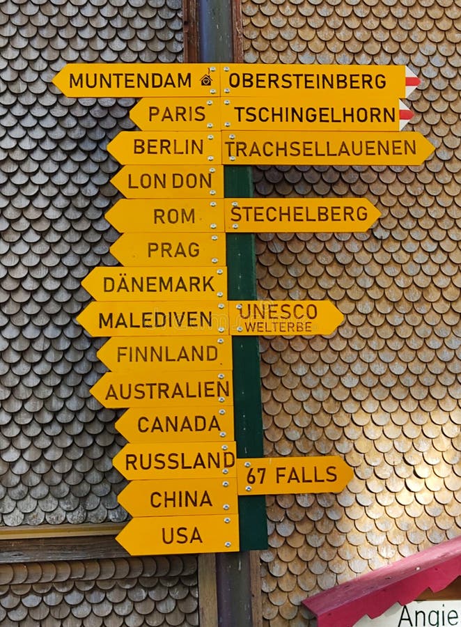 Yellow Direction Indicator Sign from Lauterbrunnen Stock Photo - Image ...