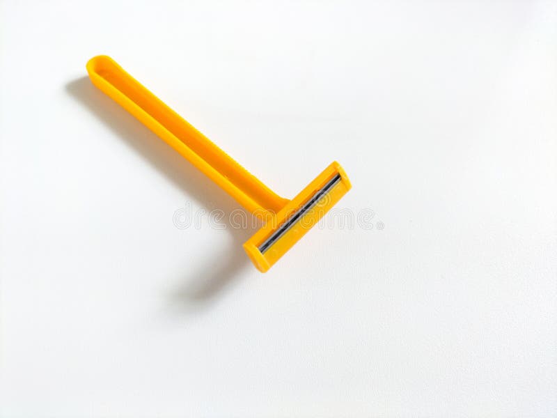 Yellow Disposable Razor on White Background Stock Image - Image of ...
