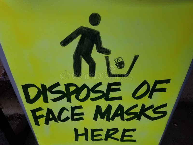 Yellow Dispose of Face Masks Here Sign and Trash Can Stock Photo ...