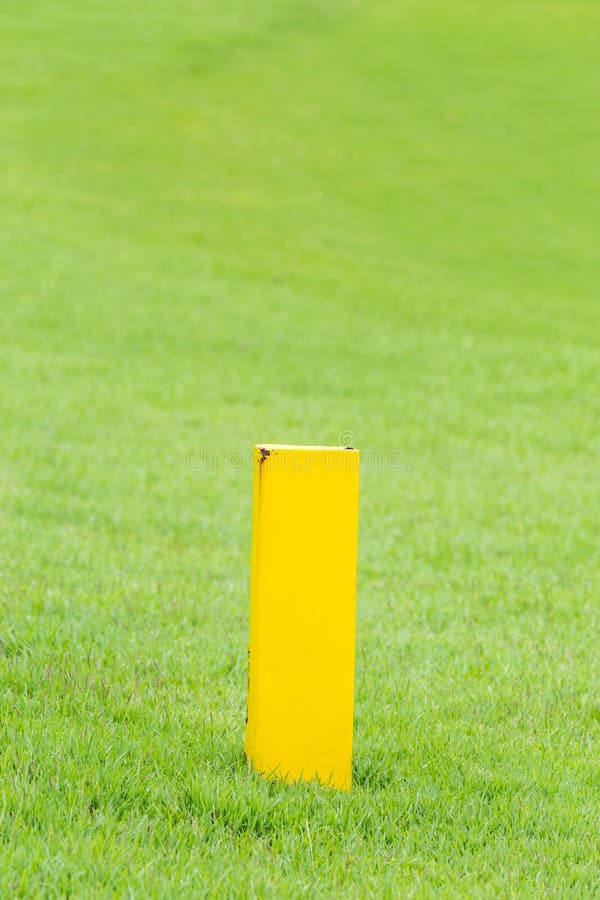 The Yellow Distance Marker Pole To Inform Range of Golfing in Gr Stock ...