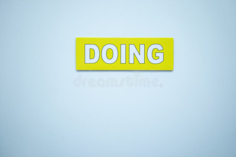 A Yellow DOING Label on a White Background, Representing Tasks ...