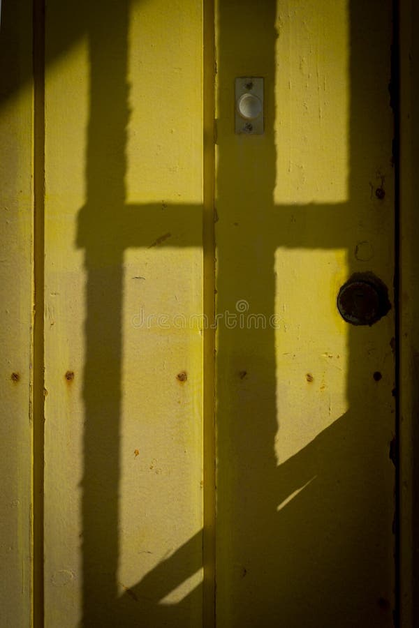 Yellow door with shadow stock photo. Image of wood, background - 51280798
