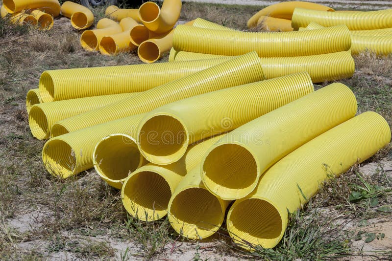 Yellow drain pipe stock image. Image of line, drainage - 98016689