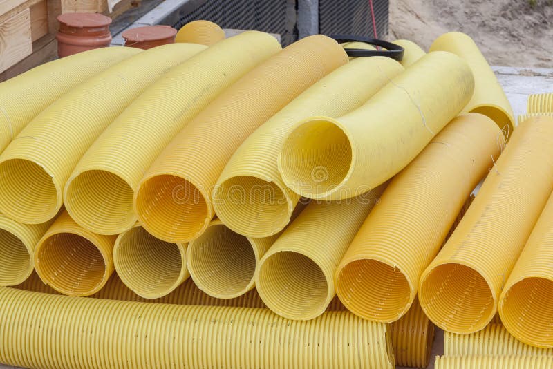 Yellow drain pipe stock photo. Image of construction - 98016744