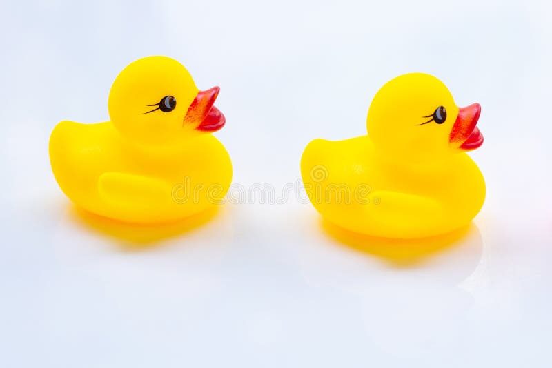 Yellow Duck Toys with Yellow Sponge on Blue Background. Kids Bath ...