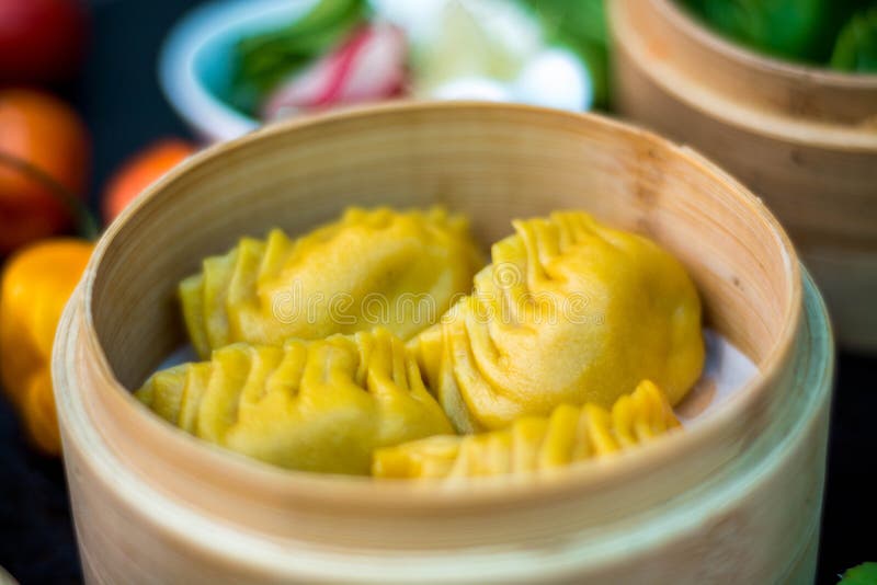Yellow Dumpling with Vegetables Stock Photo - Image of food, sauce ...