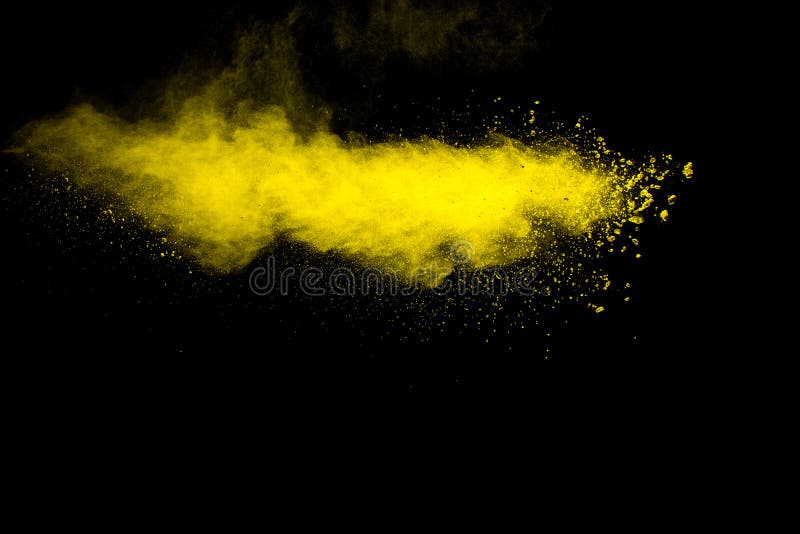 Yellow Dust Particles Explosion on Black Background.Yellow Powder ...