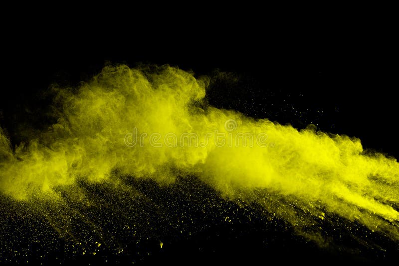 Yellow Dust Particles Explosion on Black Background.Yellow Powder ...