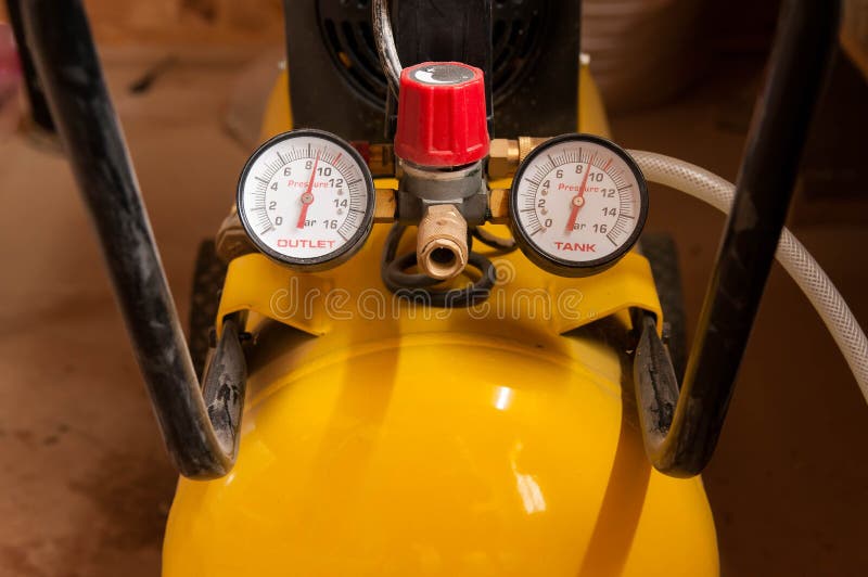 Yellow Dusty Air Compressor with Hose Stock Image - Image of ...