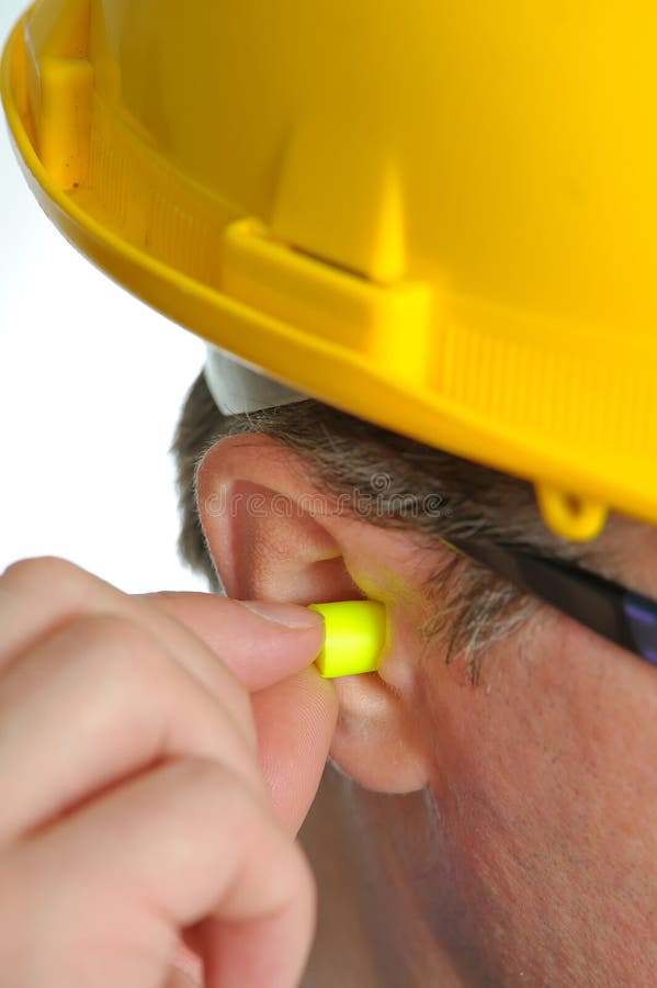 Yellow Earplug into the Ear Stock Photo - Image of closeup, health ...