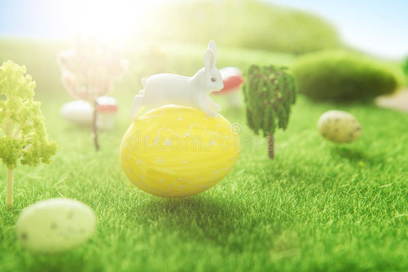 Yellow Easter Egg Spring Meadow with Rabbit and Easter Eggs. Fairy Tale ...