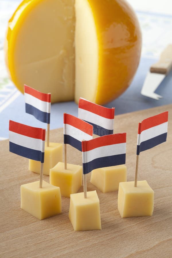 Yellow Edam Cheese Blocks with Dutch Flags Stock Photo - Image of ...
