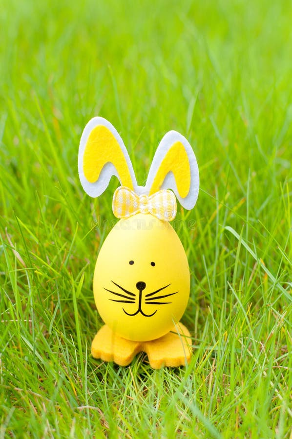 Decorative Easter Egg Bunny on Green Grass Stock Image - Image of ...