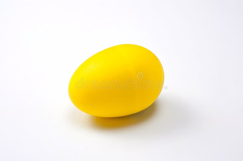 A Yellow, Egg-shaped, Plastic Shaker, a Musical Instrument Used in ...