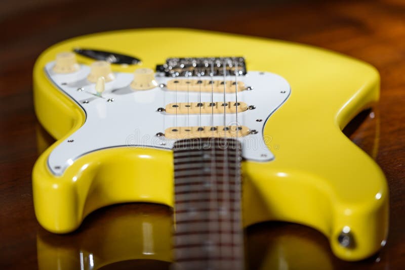 Yellow Electric Guitar with Strings Stock Photo - Image of musical ...