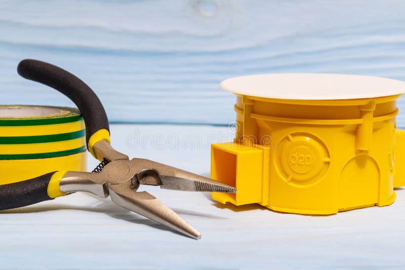 Yellow Electrical Junction Box and Tool Usually Used in the Electric ...