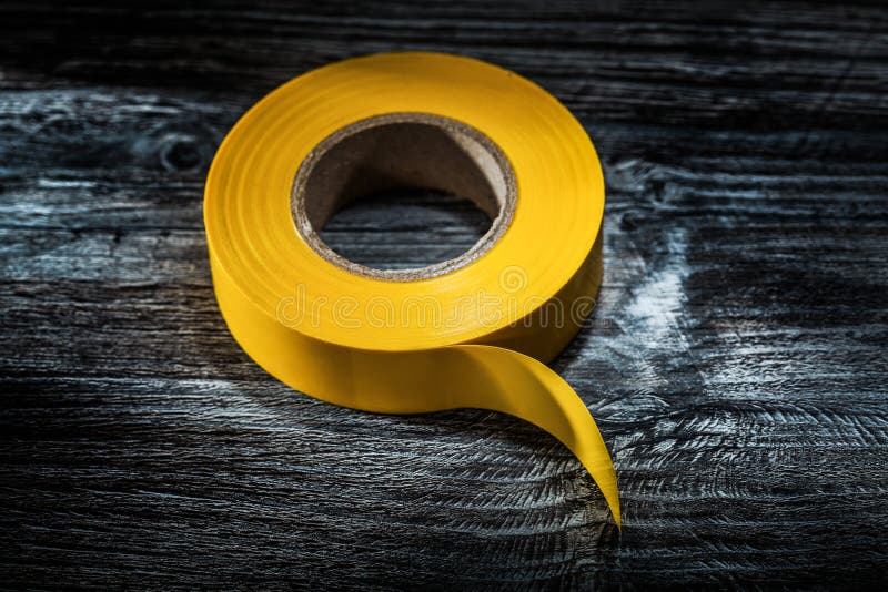 Yellow Electrical Tape on Vintage Wooden Board Stock Photo - Image of ...