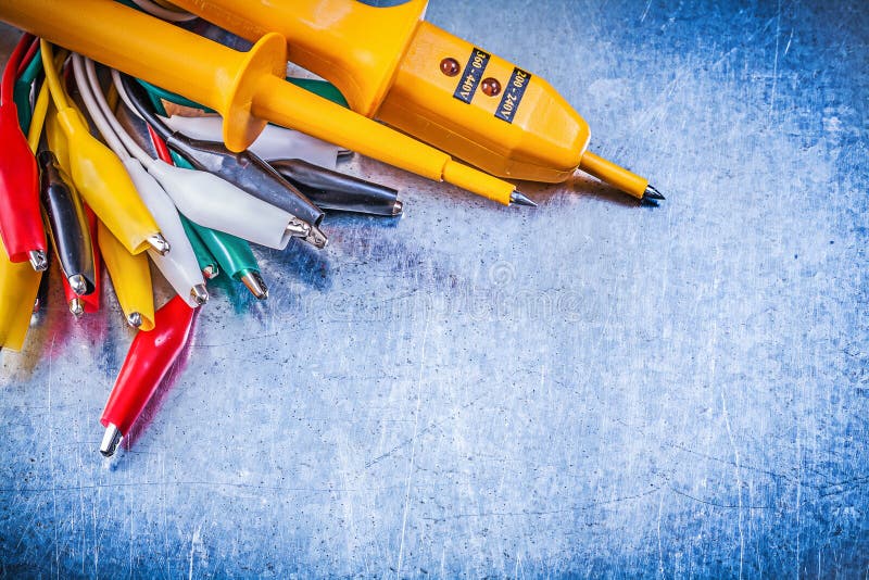 Yellow Electrical Tester Crocodile Cables Set on Metallic Backgr Stock ...