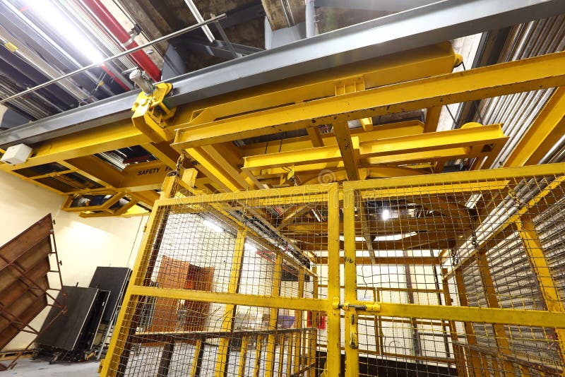 Yellow Elevator in Loading Bay To Load Heavy Machine Inside Building ...