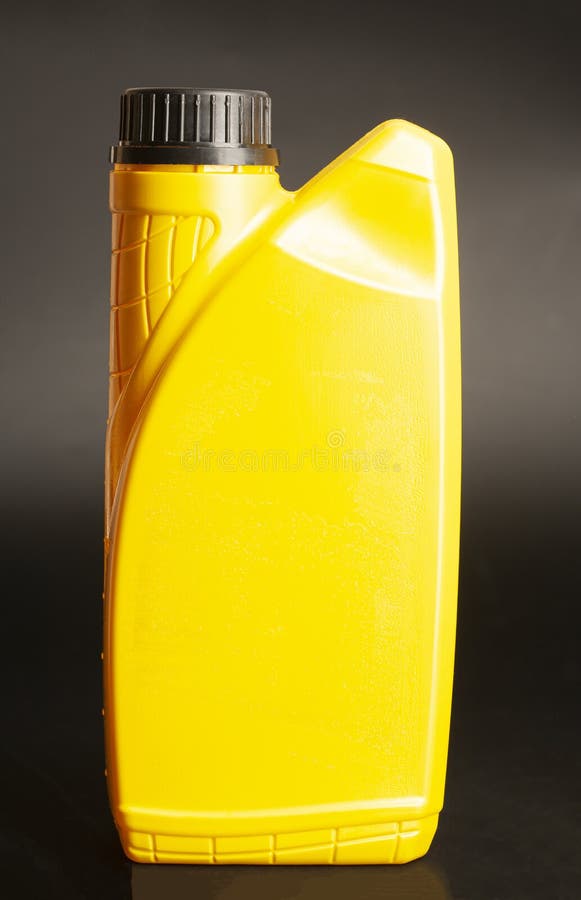 Yellow Engine Oil Bottle on Black Stock Image - Image of gasoline ...