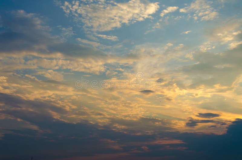 Yellow Evening Sunset in the Sky with Clouds Stock Image - Image of ...