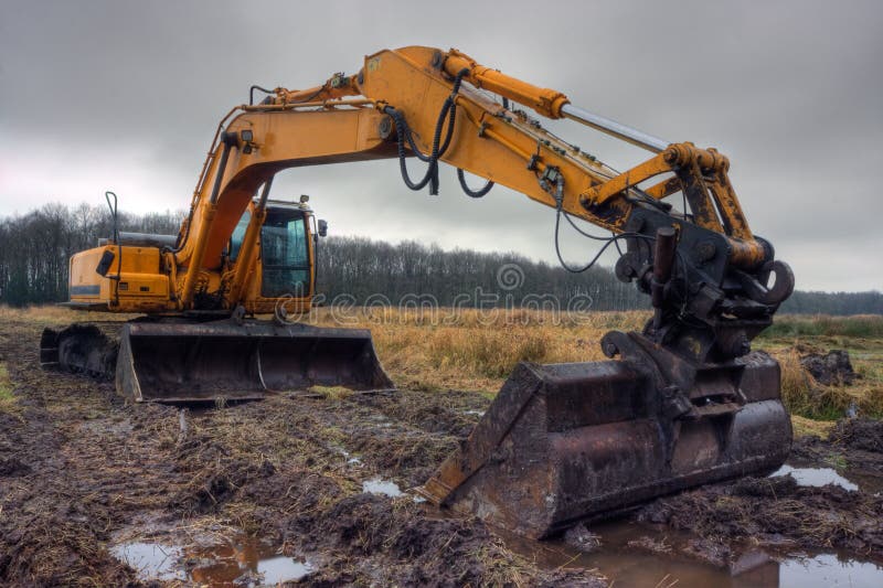 Yellow excavator stock image. Image of machine, puddle - 28228921