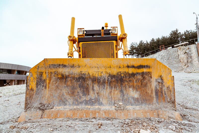 Yellow Excavator during Work. Close-up Front View. Stock Image - Image ...