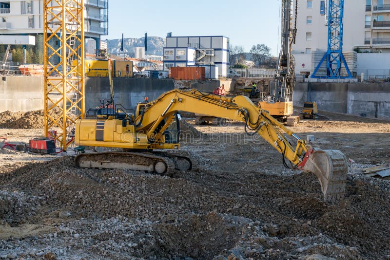 Yellow Excavator on Construction Site Editorial Photo - Image of ...