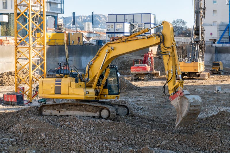 Yellow Excavator on Construction Site Editorial Photography - Image of ...