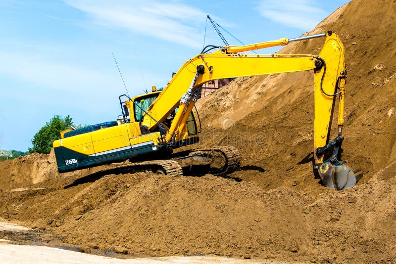 Yellow Excavator Digging in Sand Quarry. Stock Photo - Image of ...