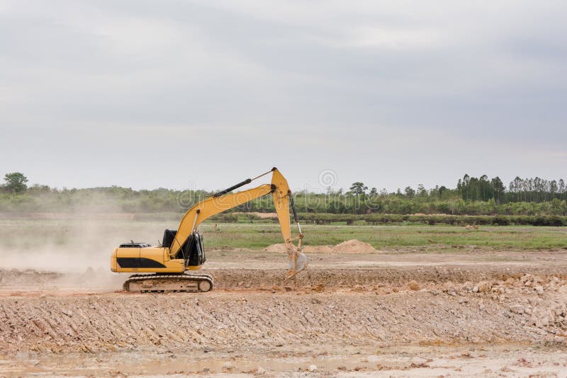 Yellow Excavator Machine Working Earth Moving Works at Construct Stock ...