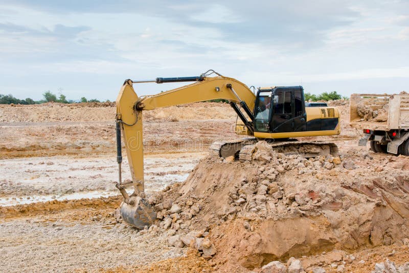 Yellow Excavator Machine Working Earth Moving Works at Construct Stock ...
