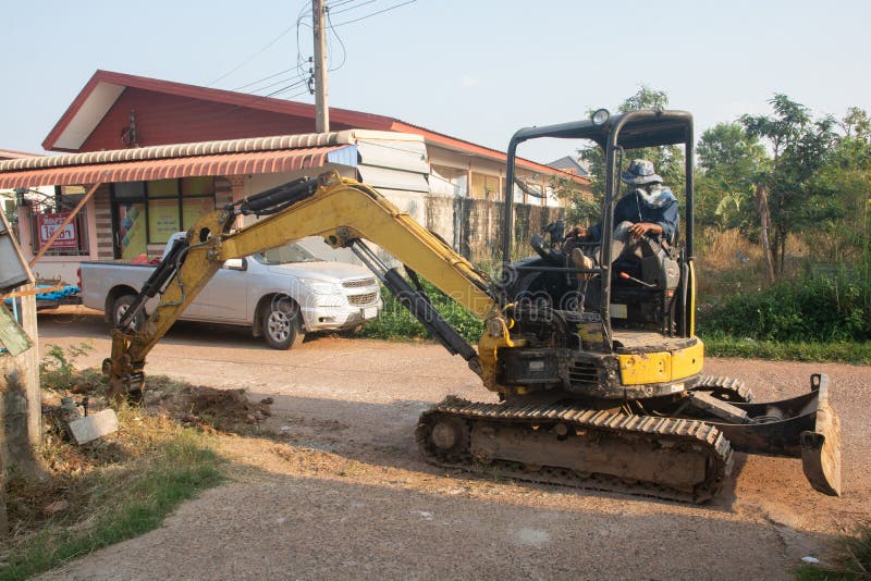 Yellow Excavator Machine Working Earth Moving Works at Construction ...