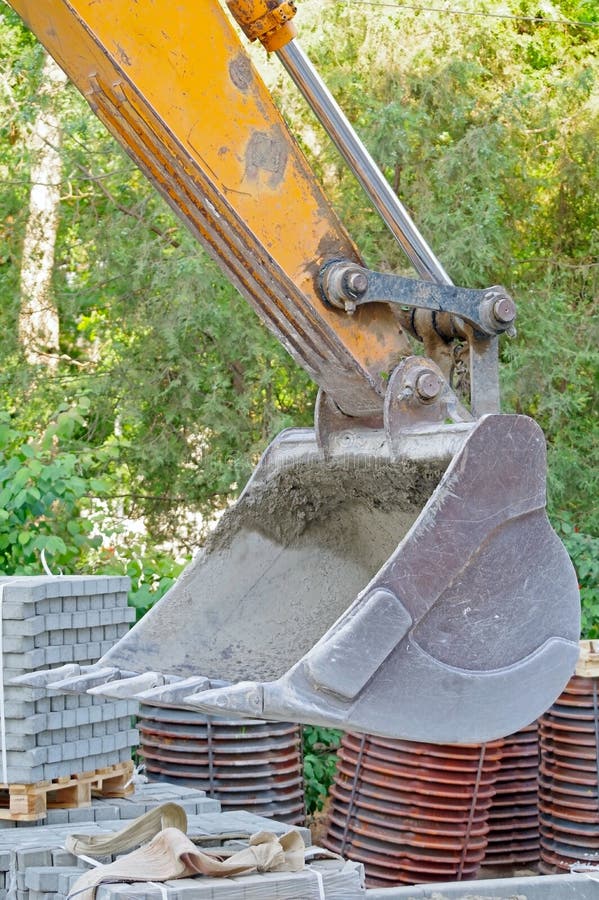 Yellow excavator machines stock image. Image of dredger - 154559503