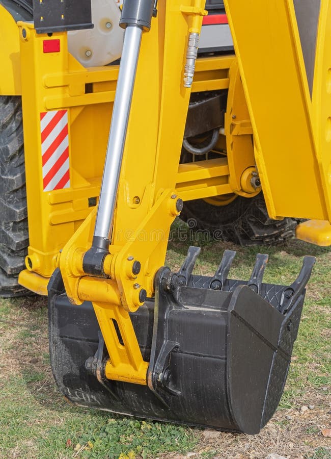 Yellow excavator machines stock photo. Image of machine - 271344914