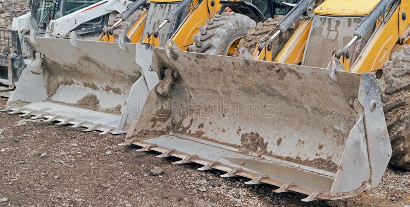 Yellow excavator machines stock image. Image of loader - 114258697