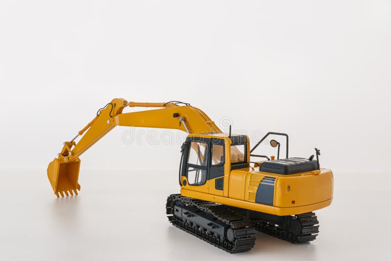Yellow Excavator with Back and Side Views Stock Photo - Image of ...