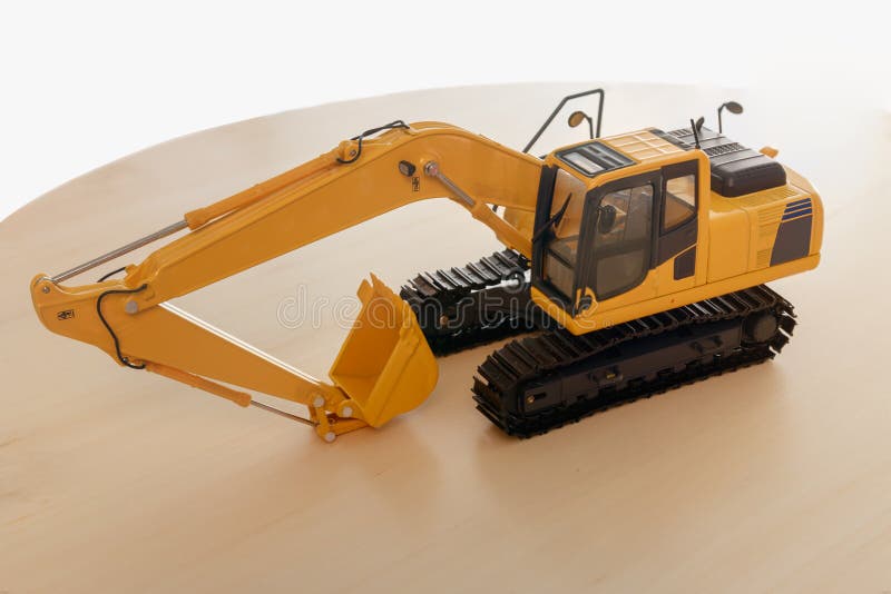 Yellow excavator model stock photo. Image of dozer, dirt - 195033984