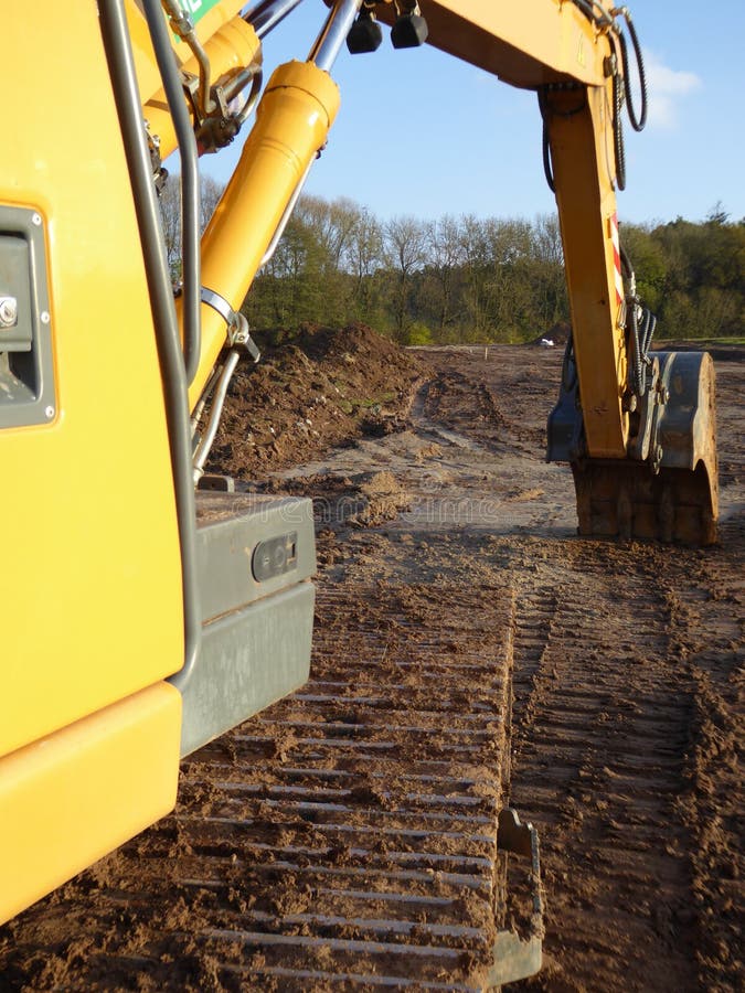 Yellow excavator stock image. Image of tracklaying, costruction - 81033267