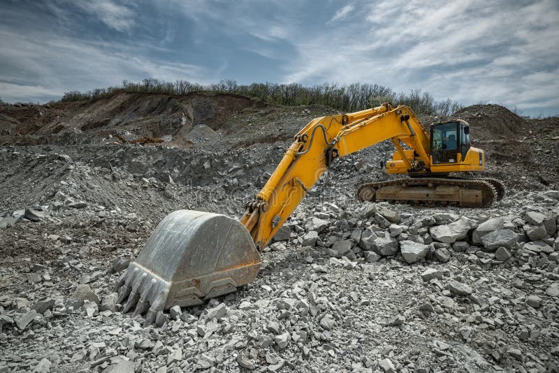 Excavator in a Stone Quarry Stock Image - Image of hydraulic ...