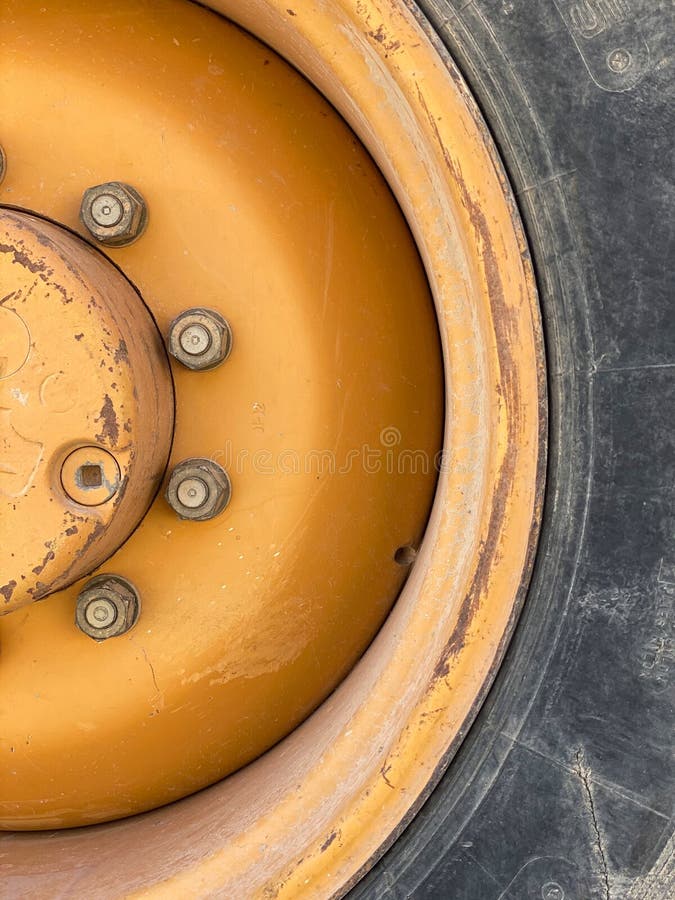Yellow Excavator Wheel on a Construction Site Stock Photo - Image of ...