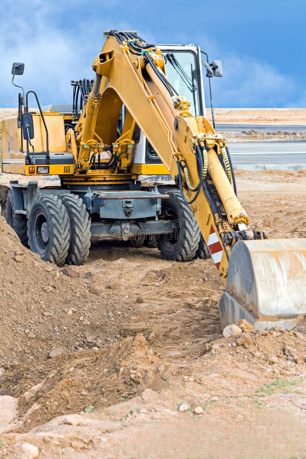 Yellow excavator stock image. Image of building, construction - 42417263
