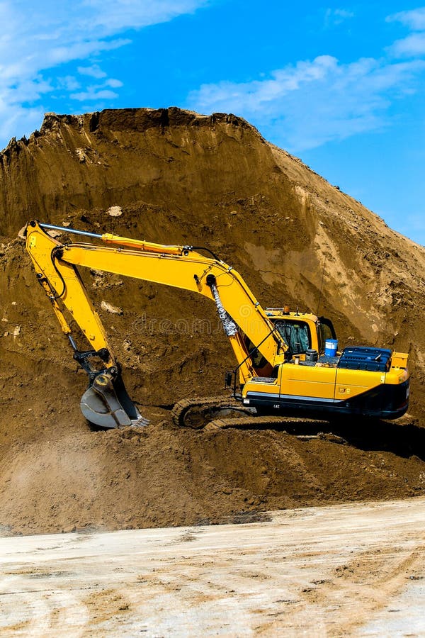 Yellow Excavator Working Digging in Sand Quarry Editorial Photography ...