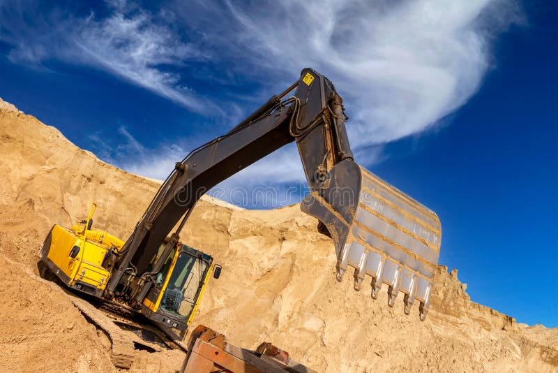 Yellow Excavator Working with Sand at Construction Site Stock Image ...