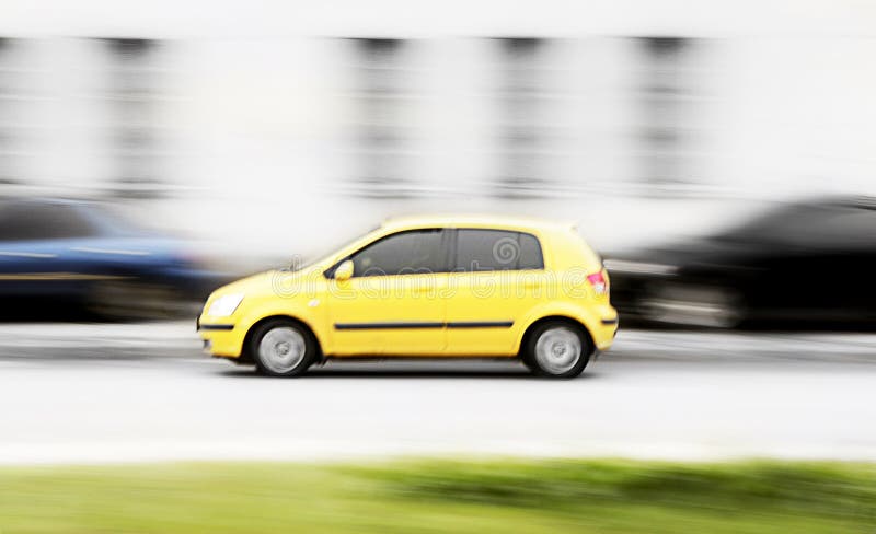 Yellow fast car stock photo. Image of blur, detail, automobile - 13932878